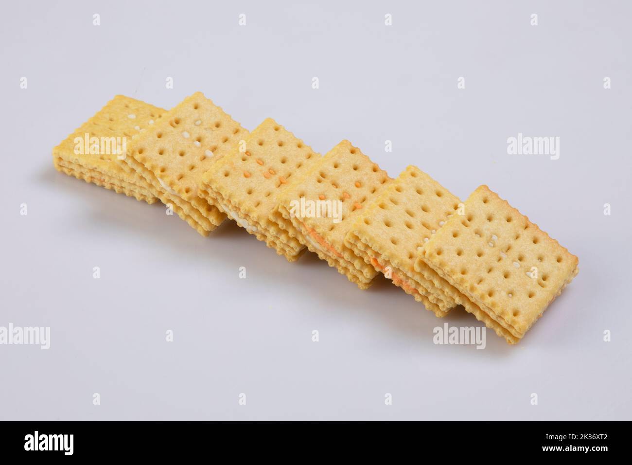 Top view of square salted snack cracker cookie isolated in White back ...