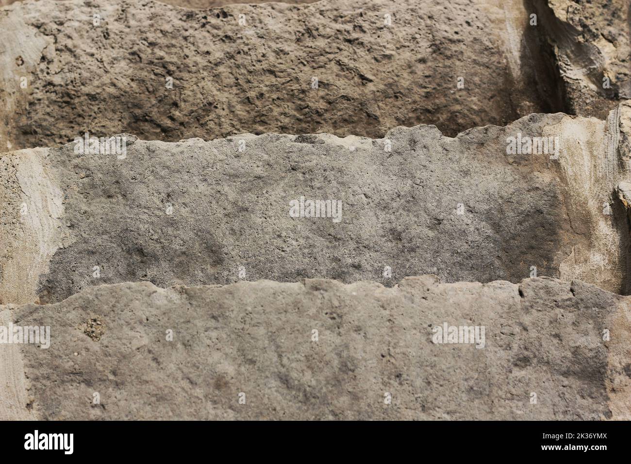 Ancient uneven stone stairs with weathered steps Stock Photo - Alamy