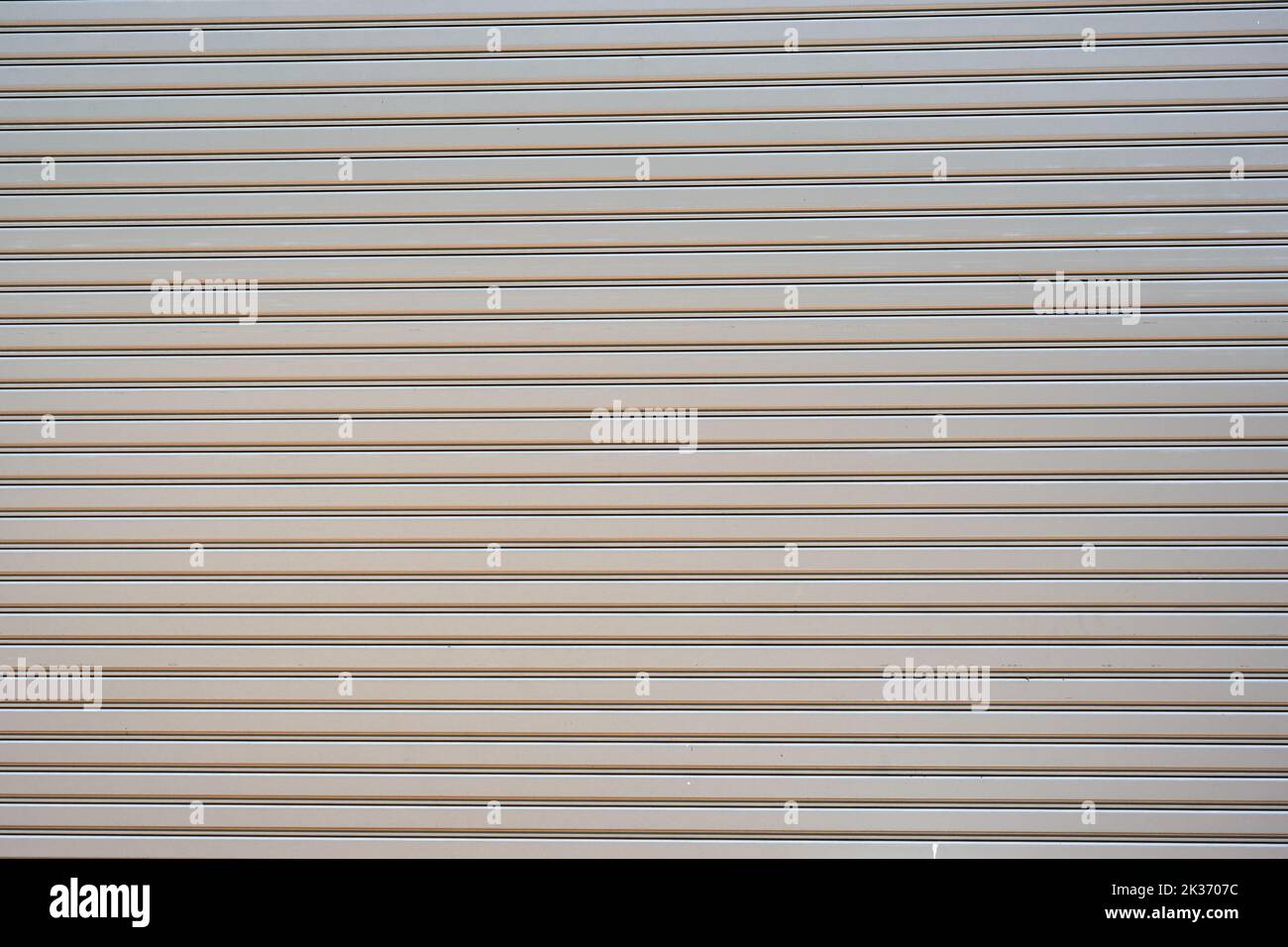A texture of steel rolling door of shop or store Stock Photo - Alamy