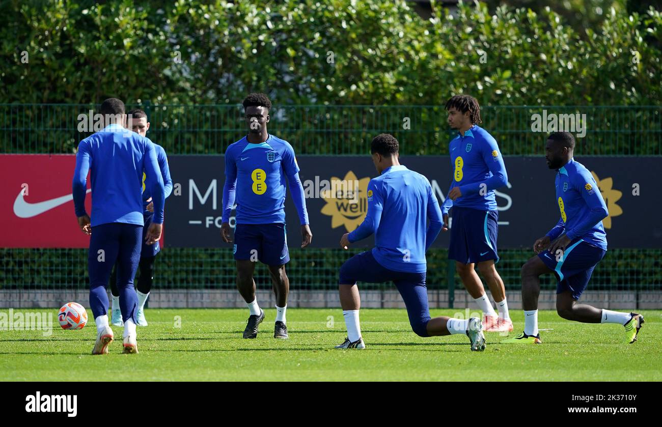 England's Bukayo Saka (centre left) during a training session at ...