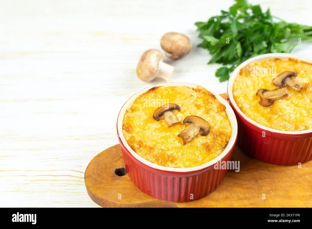 Chicken and mushroom casserole with golden crust, julienne with baked ...