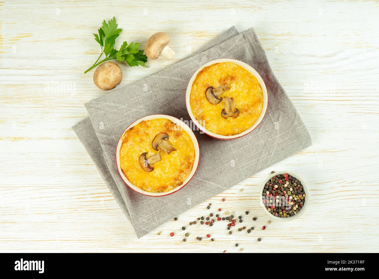 Chicken and mushroom casserole with golden crust, julienne with baked ...