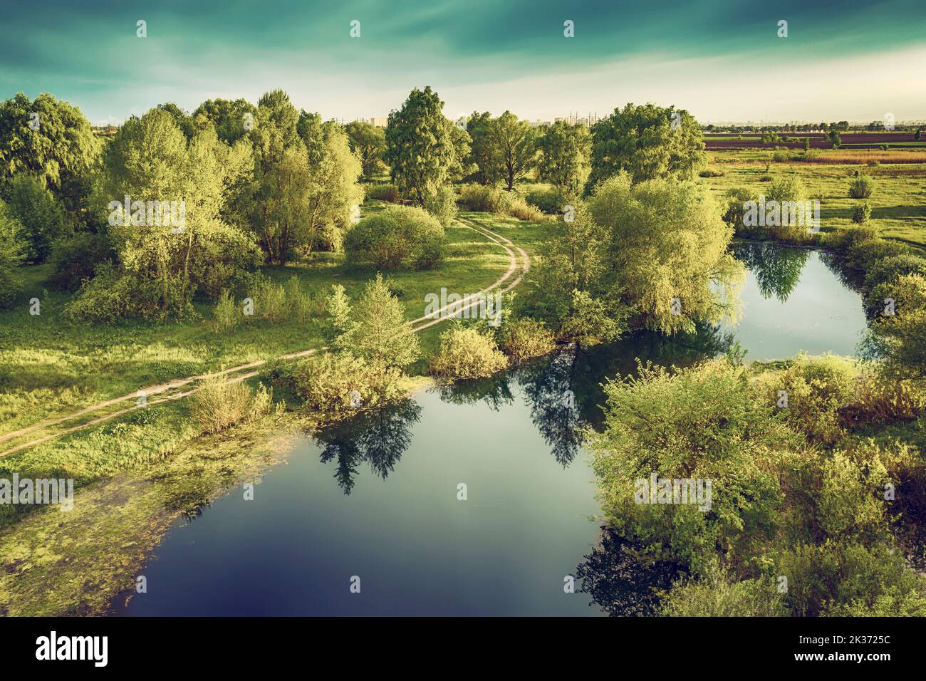 Spring landscape with river Stock Photo - Alamy