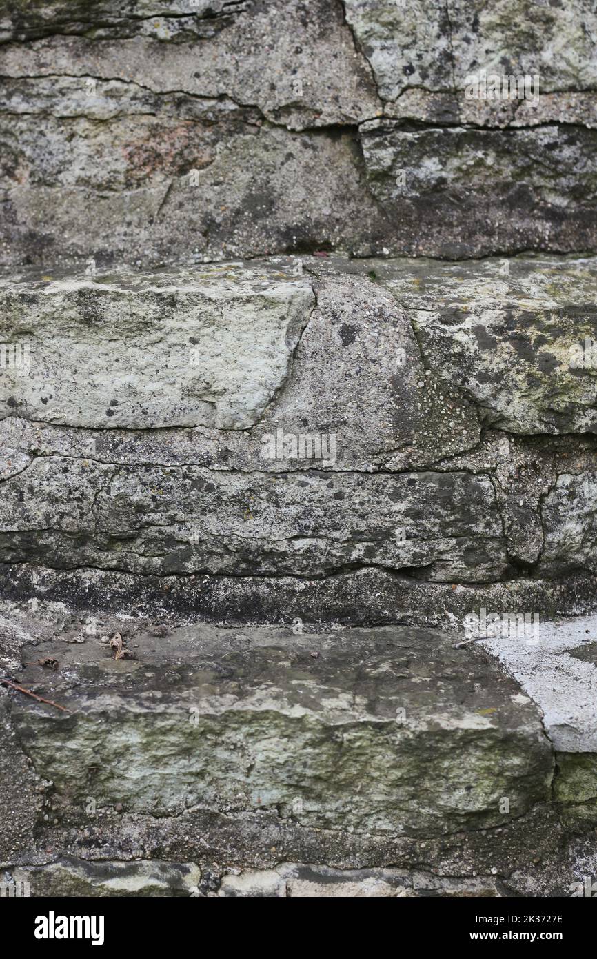 An old limestone stone wall with layers and cracks Stock Photo - Alamy