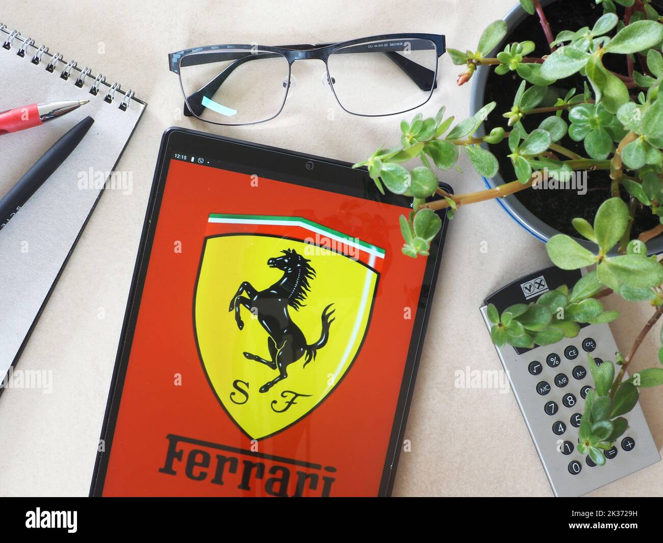 In this photo illustration, Ferrari NV logo seen displayed on a tablet ...