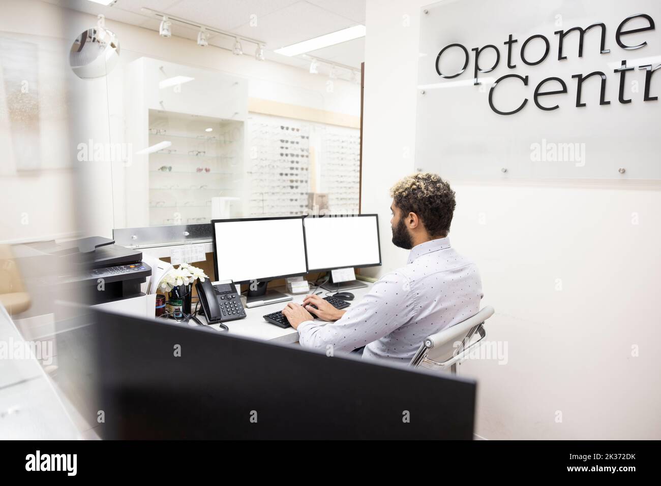 Black optometry hi-res stock photography and images - Alamy