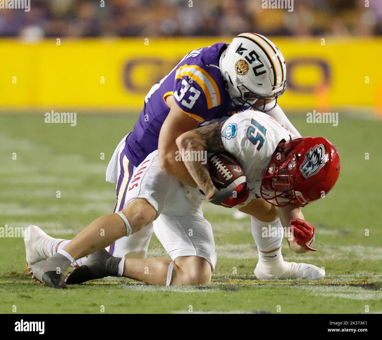 LSU Tigers linebacker West Meeks (33) tackles New Mexico Lobos wide ...
