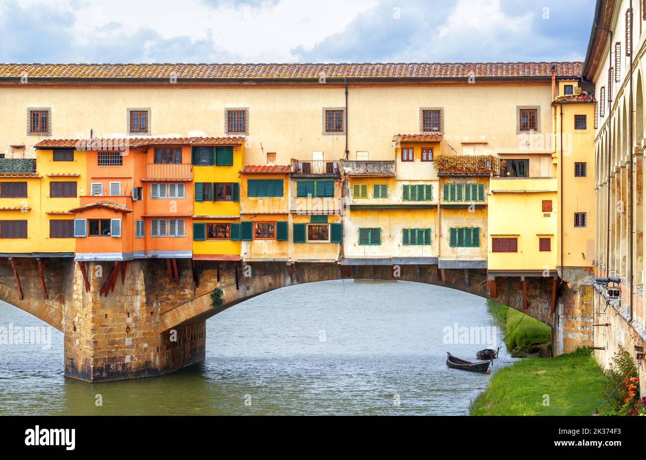 Ponte Vecchio over Arno river, Florence, Italy. This old bridge with ...