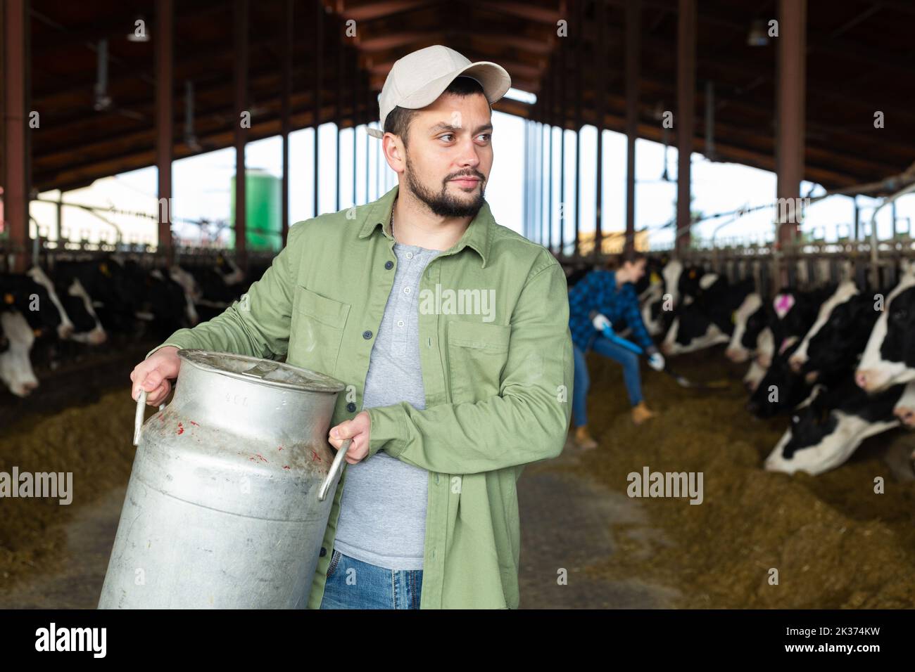 Carrying milk in metal container hi-res stock photography and images ...