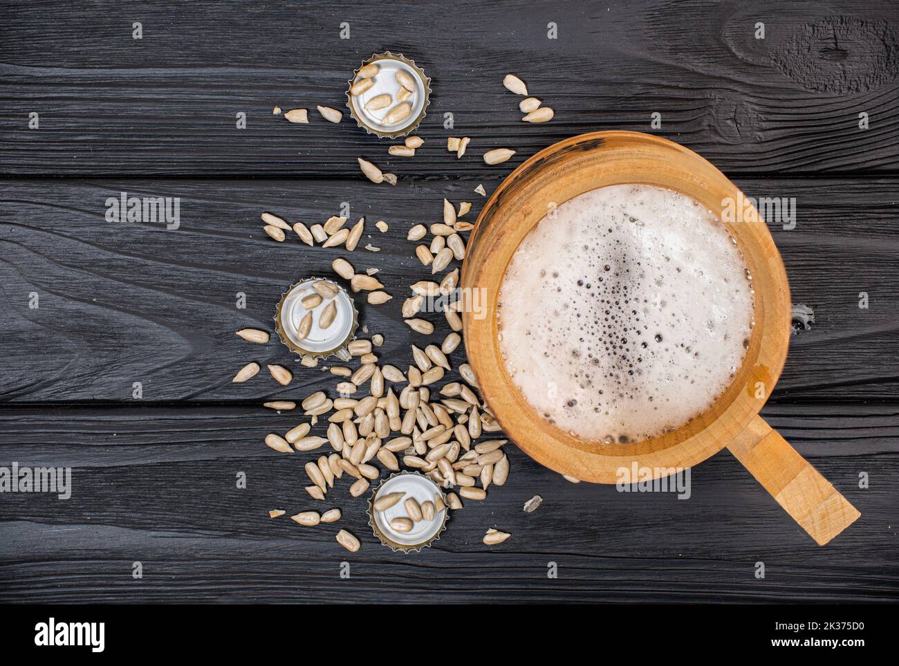 top view, on a cup with beer and seeds Stock Photo - Alamy