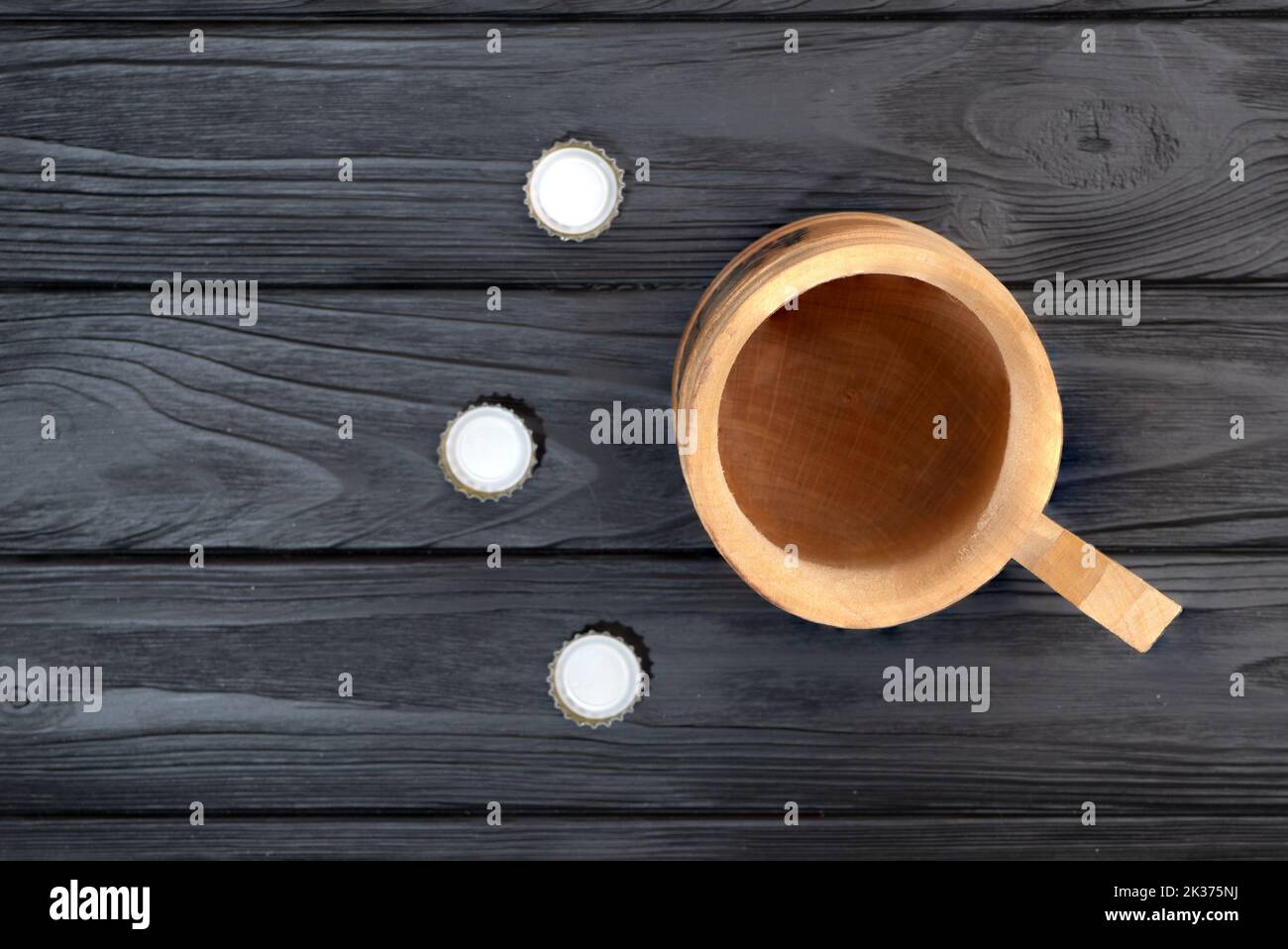 top view, on an empty cup for beer and lids Stock Photo - Alamy