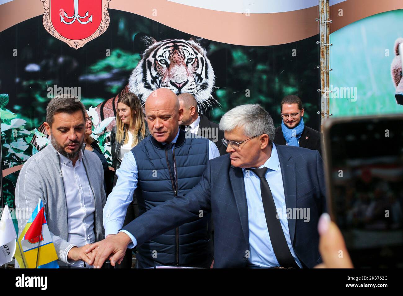 Director of the Odessa branch Sergey Drozd (left), mayor of Odessa Gennady Trukhanov (center ...