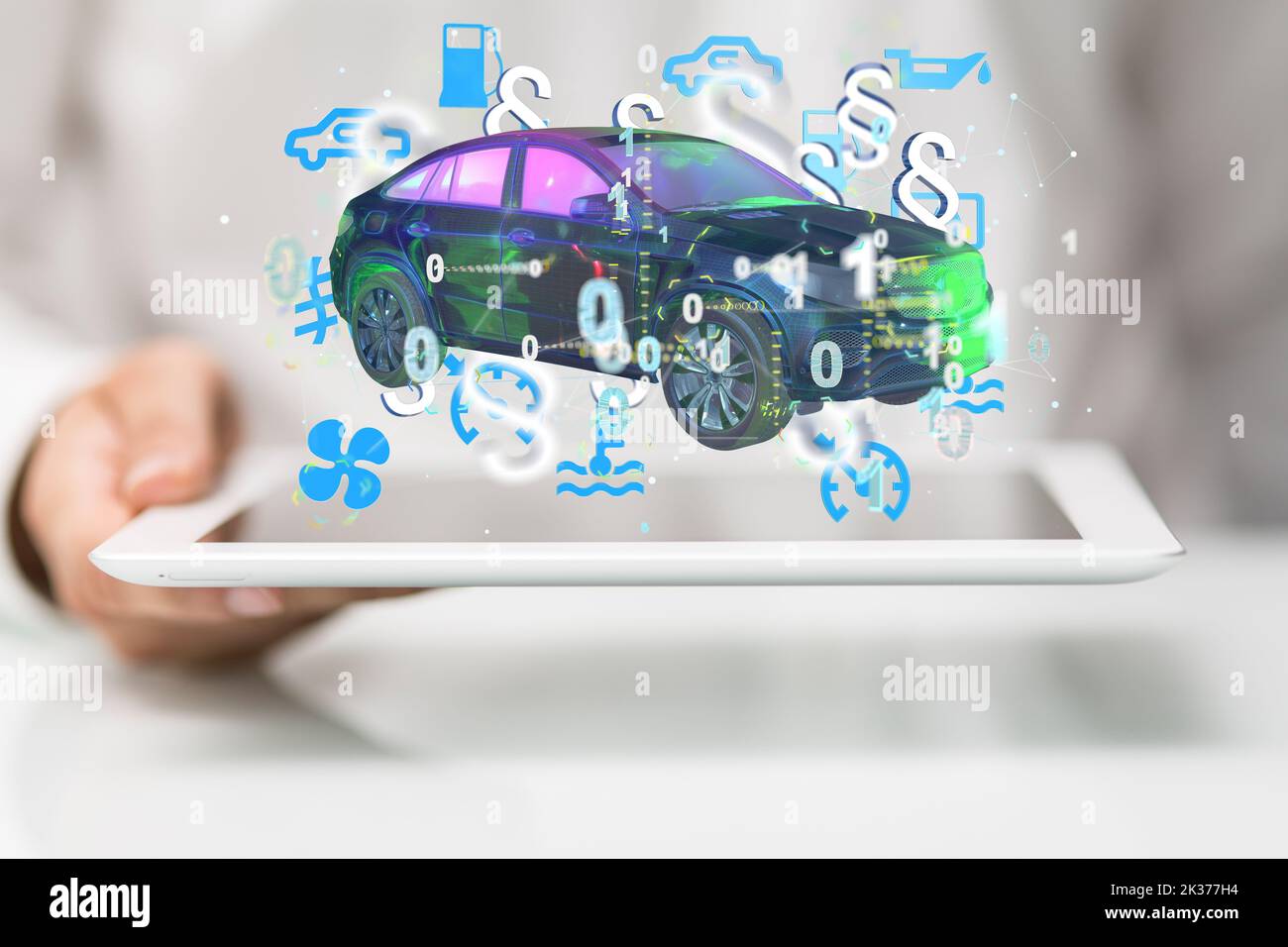 The man holding the tablet with digital 3d car and different items ...