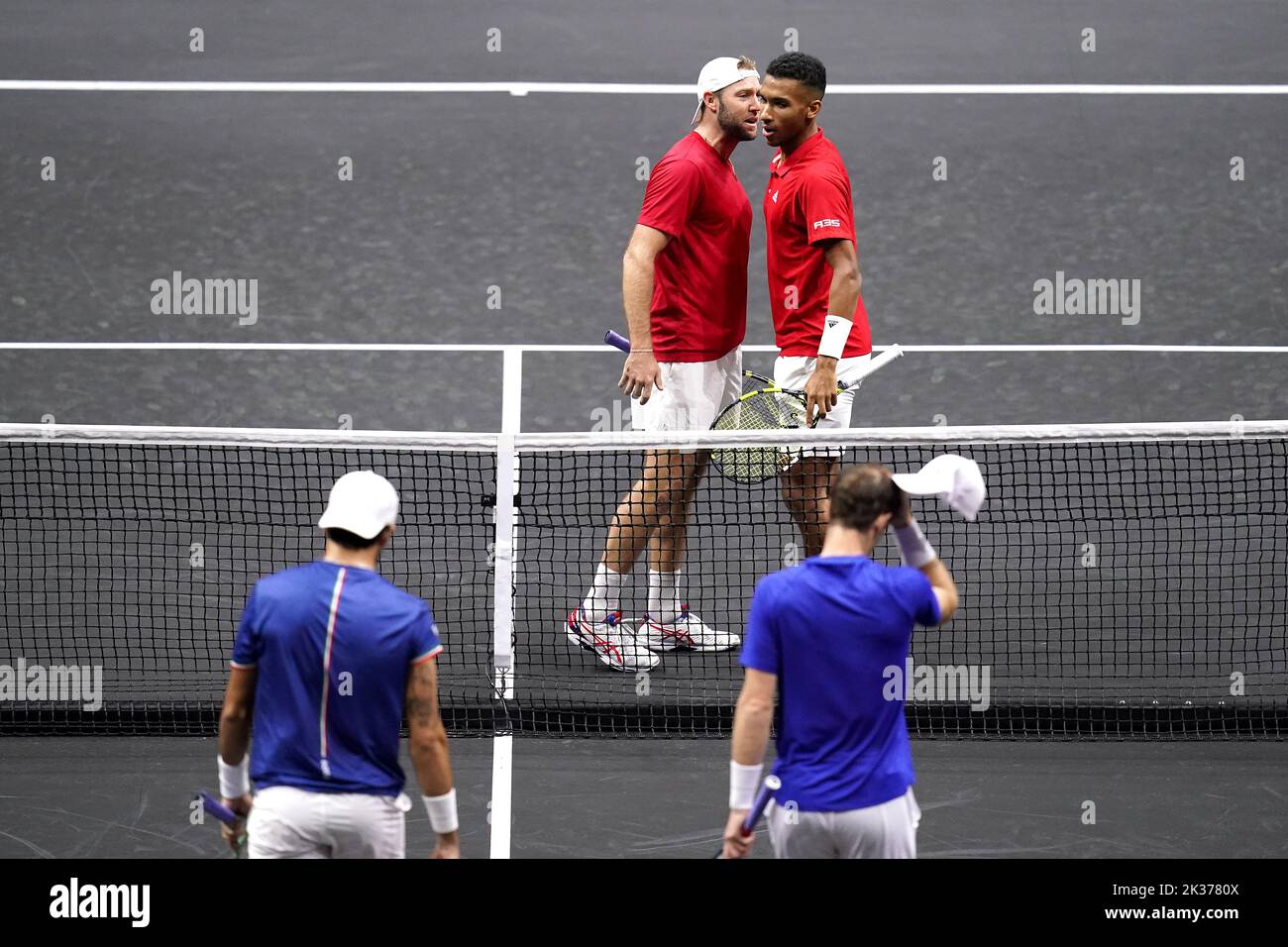 Jack Sock (left) and Felix Auger Aliassime celebrate victory in the doubles match against Matteo ...