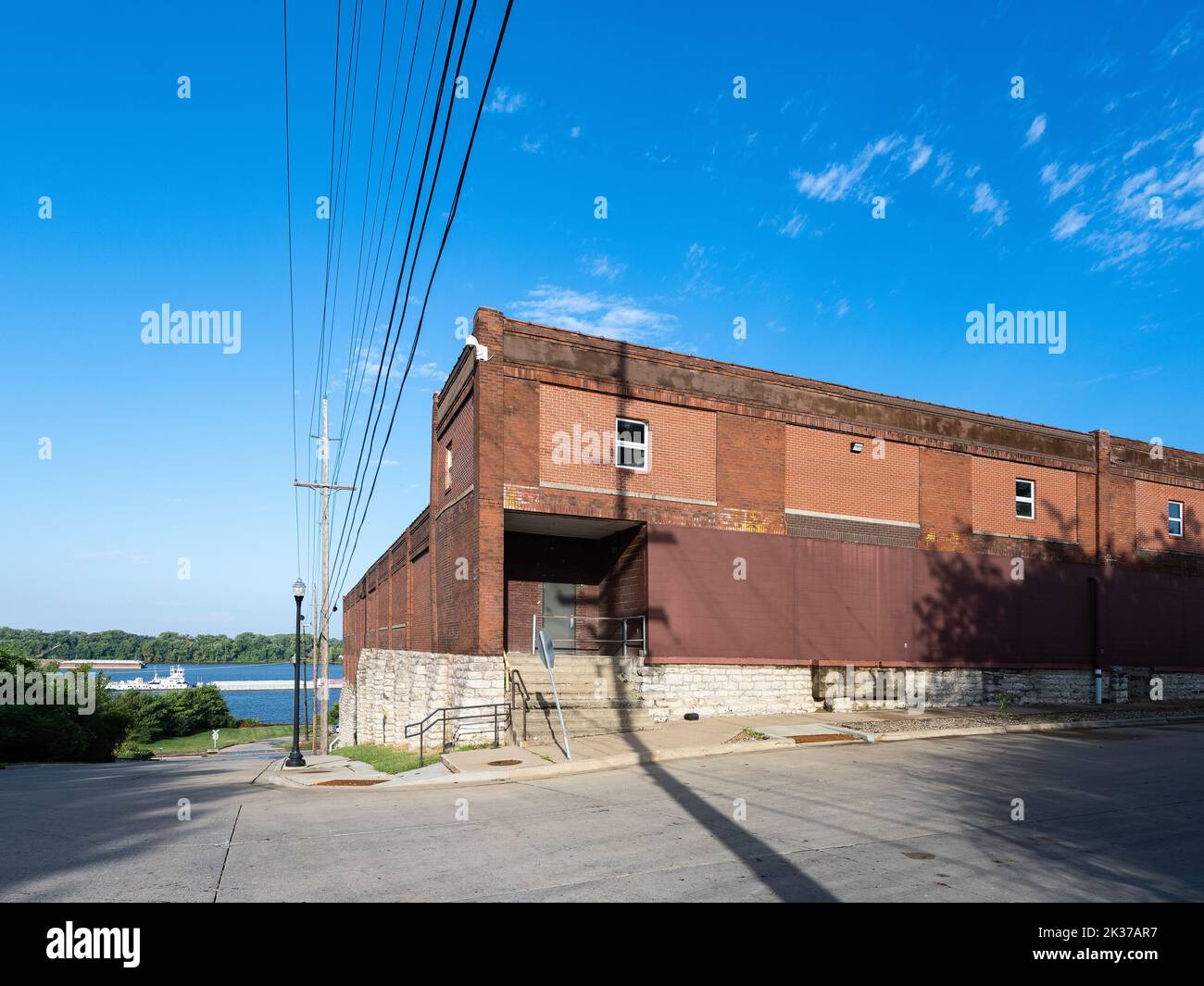 Brick industrial building near the river in Quincy Stock Photo - Alamy