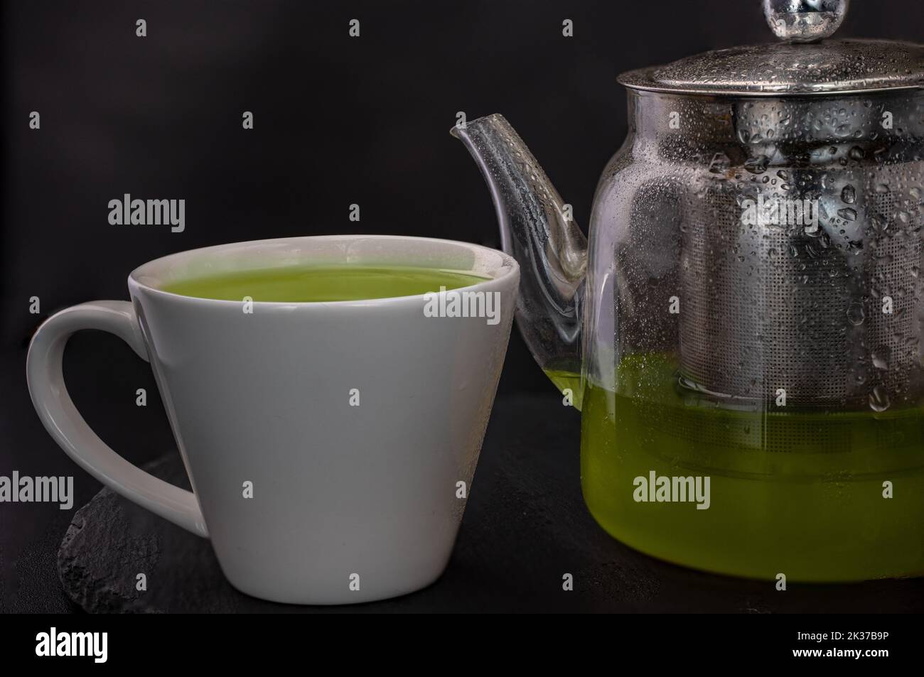 Japanese green tea on a stone stand Stock Photo - Alamy