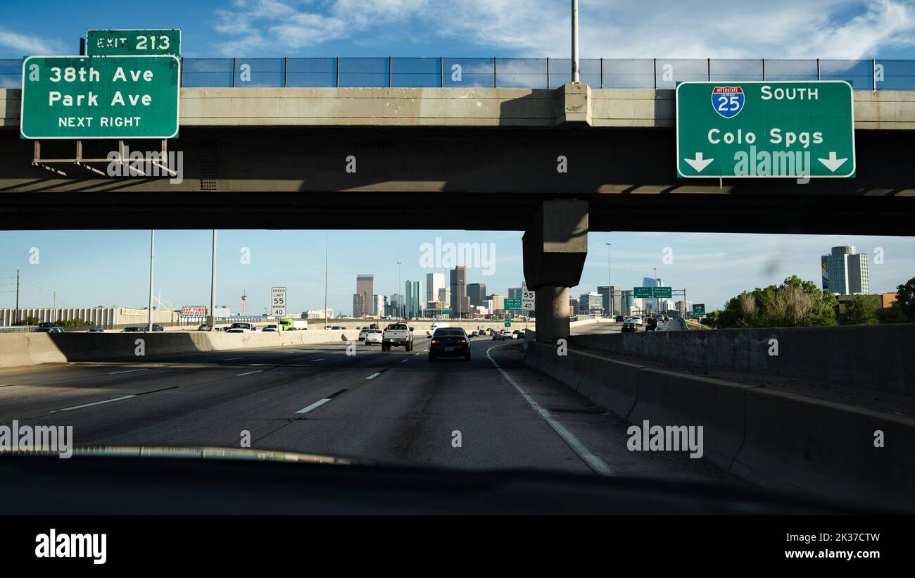 A road with a view of the bridge with green signs on it Stock Photo - Alamy