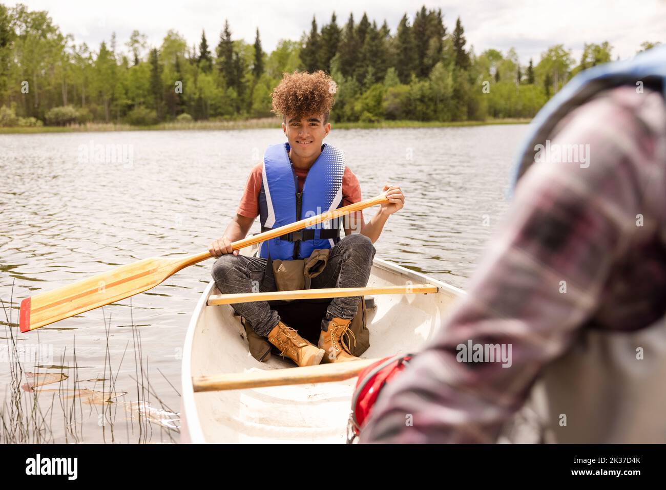 Person in canoe hi-res stock photography and images - Alamy