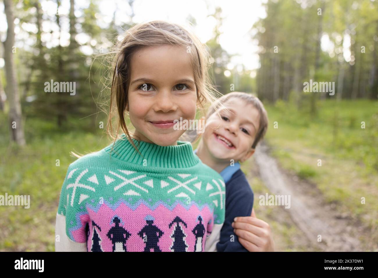 Happy brother sister hug in hi-res stock photography and images - Alamy