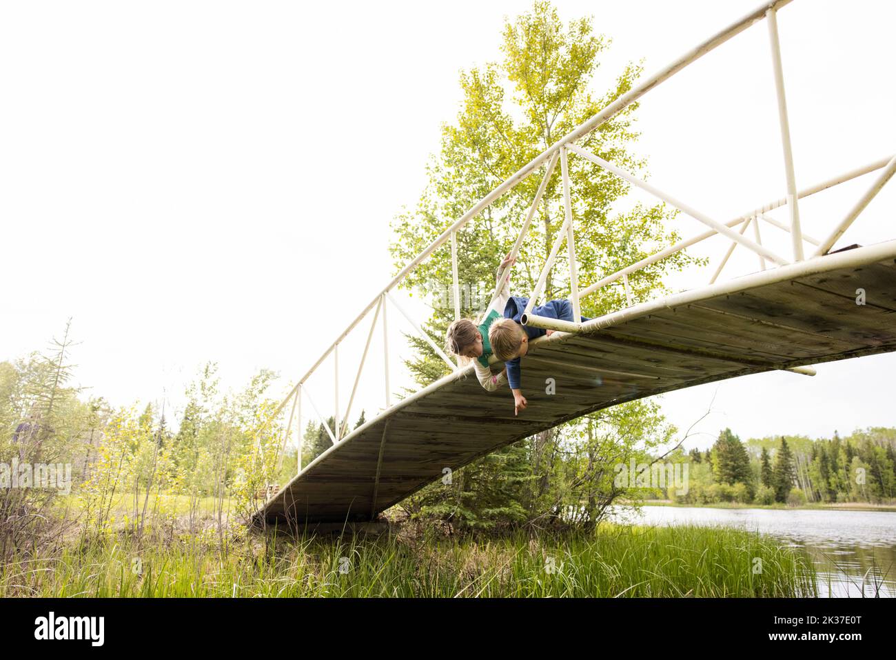 Two boys playing forest hi-res stock photography and images - Alamy