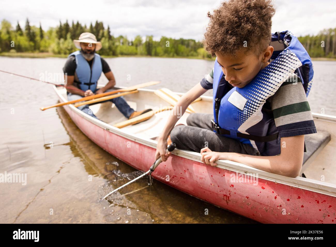 Fishing in canoe hi-res stock photography and images - Alamy