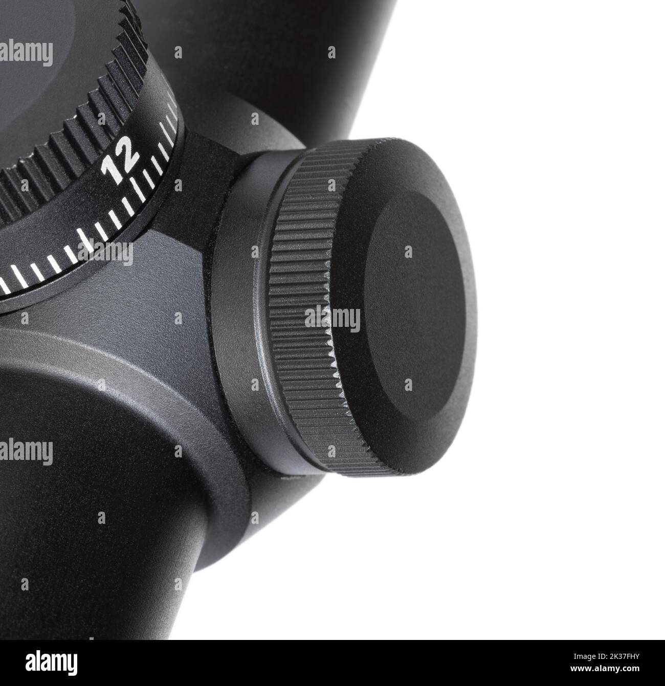 Rifle sight windage adjustment knob that is covered by a cap on a white ...