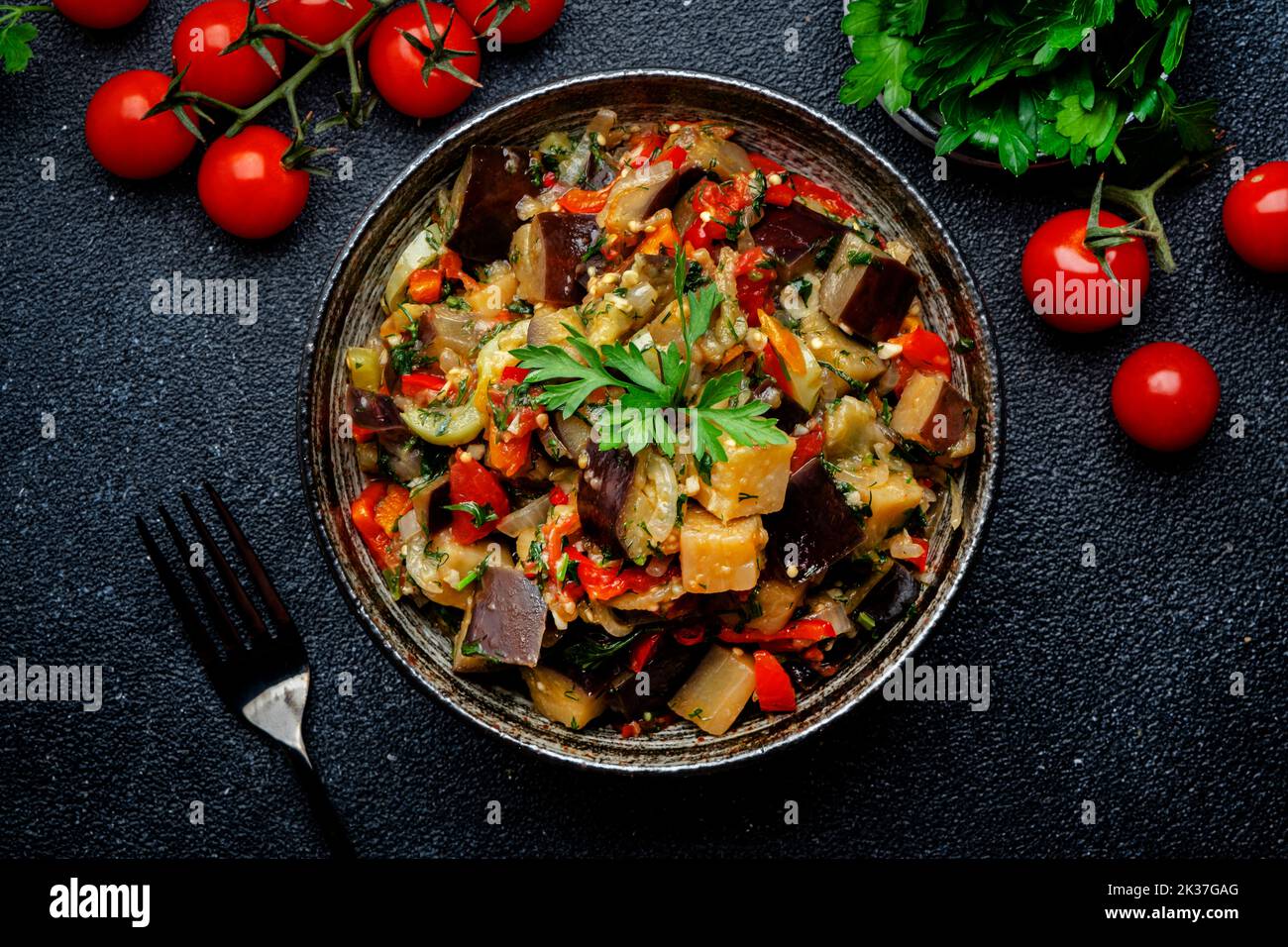 Vegetable stew, saute or caponata. Stewed eggplant with paprika ...