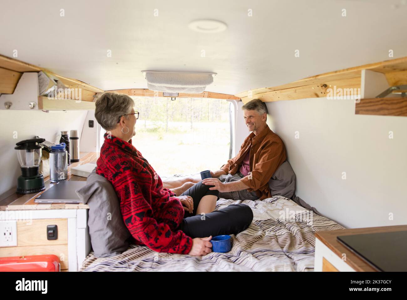 Woman sitting in camper van hi-res stock photography and images - Alamy