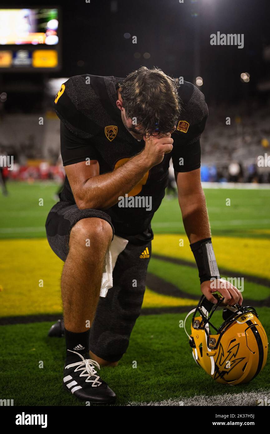 Arizona State quarterback Paul Tyson (9) kneels to pray before going ...