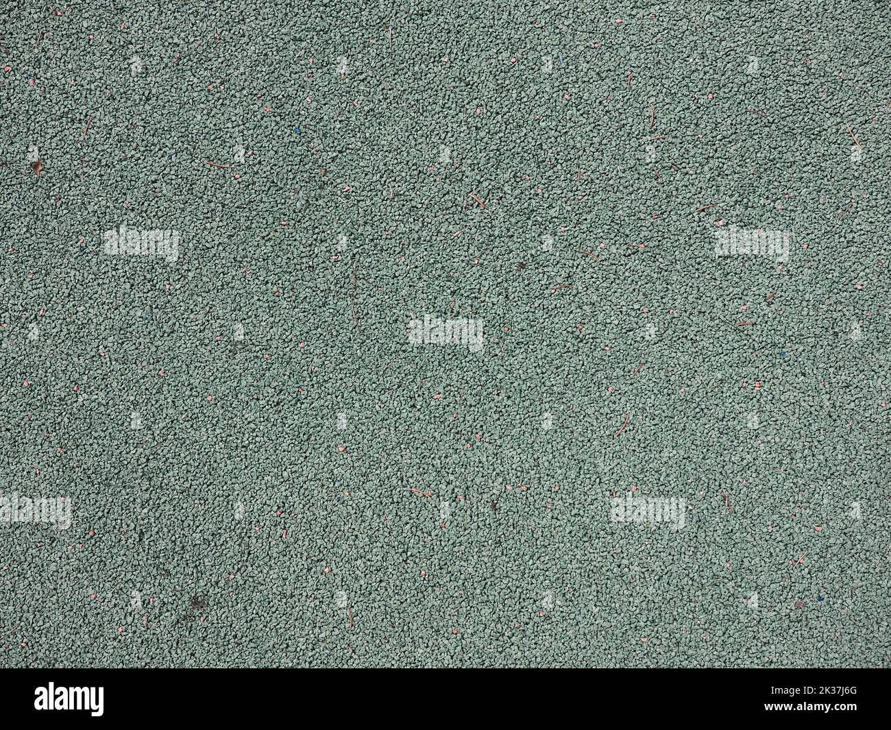 green pebbles texture background. park or playground flooring material ...