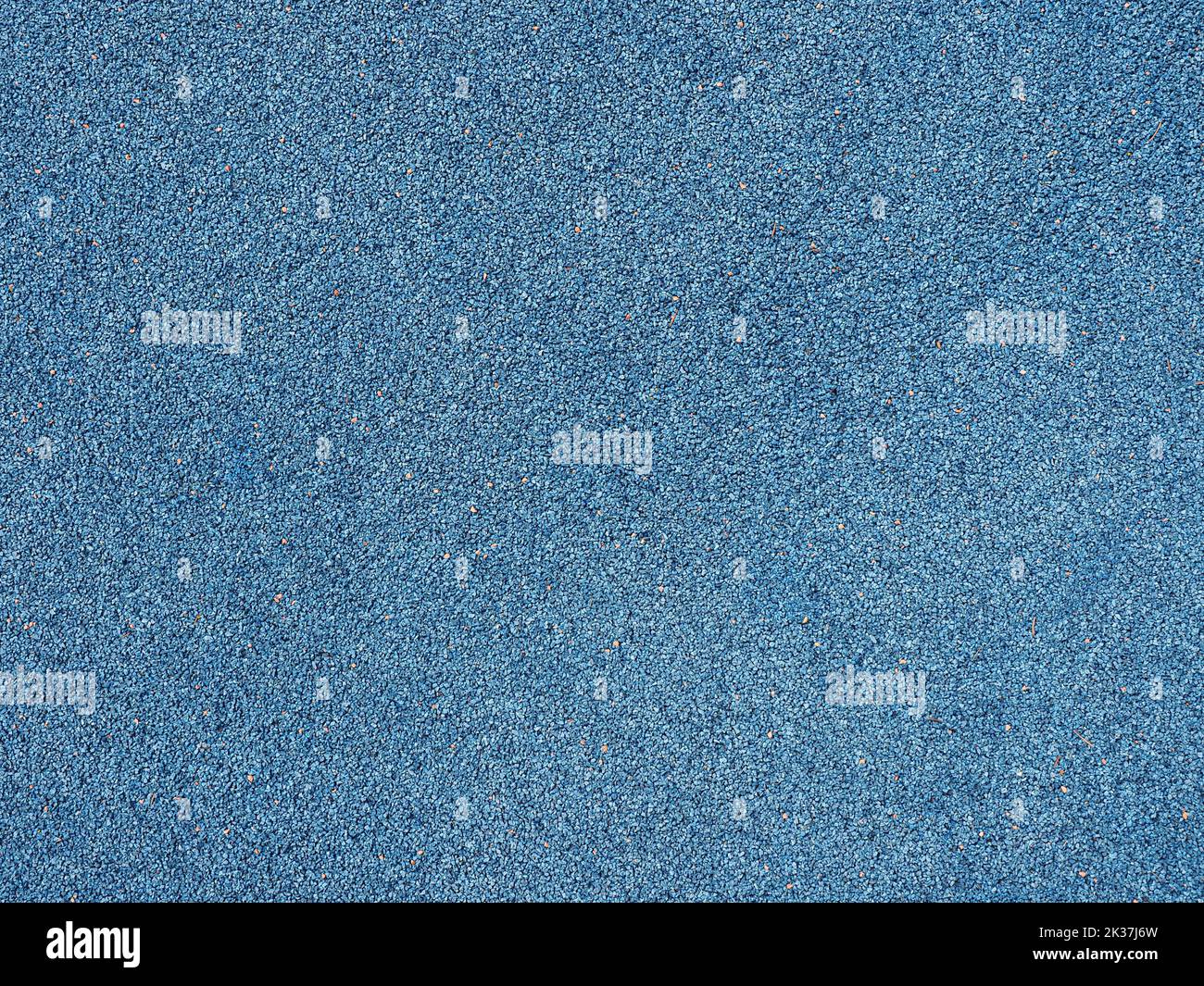 blue pebbles texture background. park or playground flooring material ...