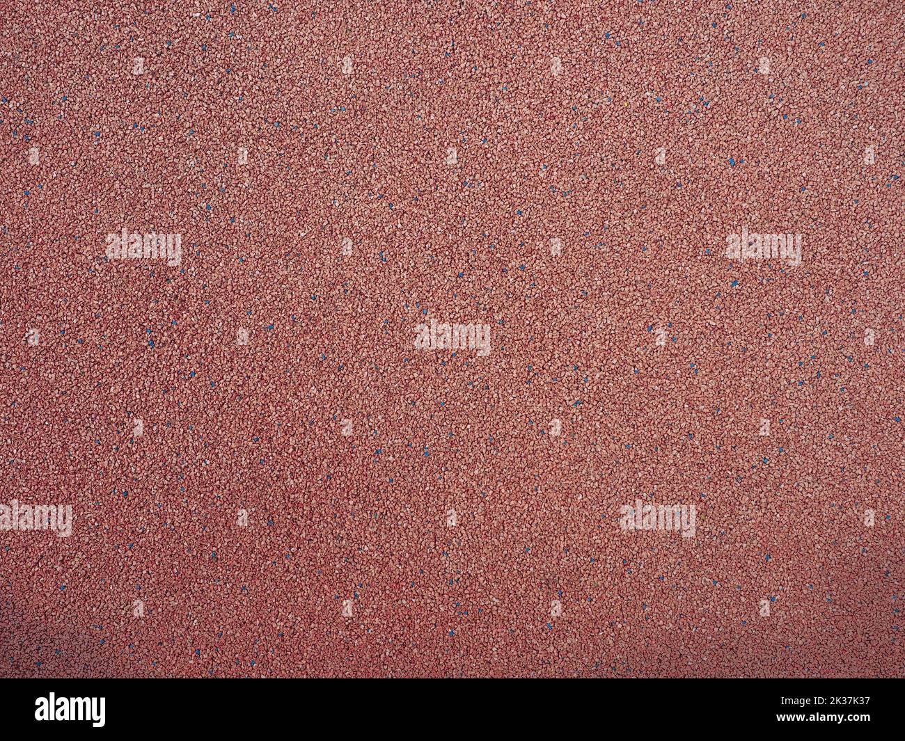 red pebbles texture background. park or playground flooring material ...