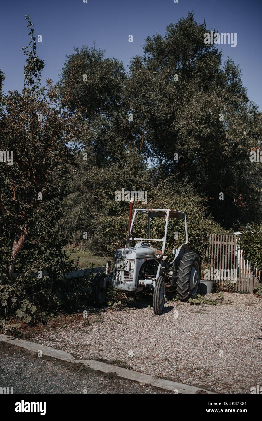 A vertical shot of a vintage Volvo tractor in a small village Stock ...