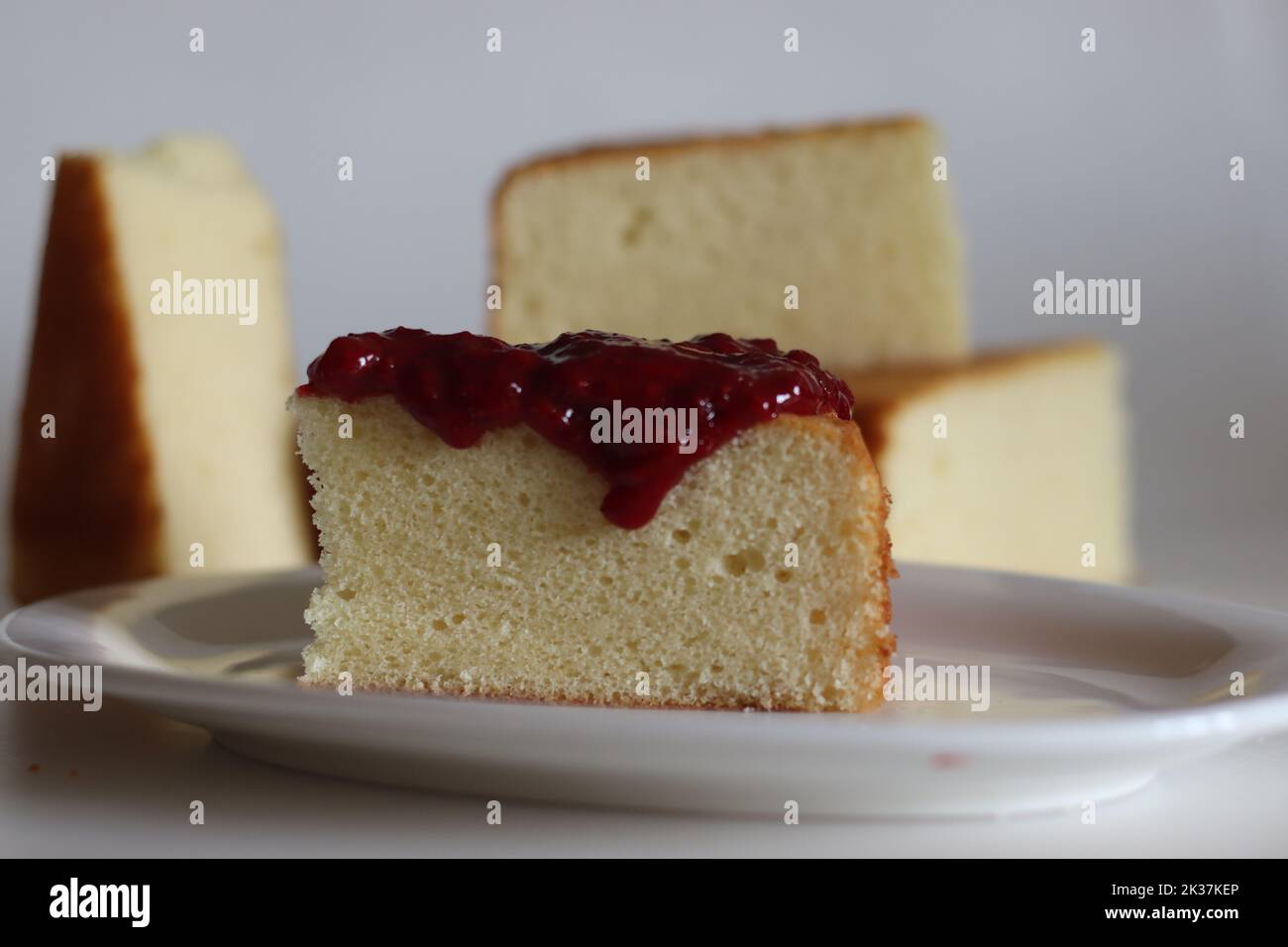 Holt milk cake served with fresh homemade strawberry sauce on top ...