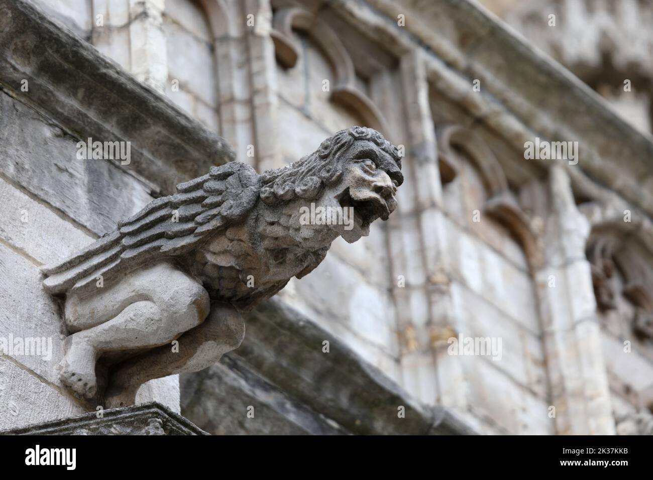 Monstrous statue with almost human features called gargoyle on the ...