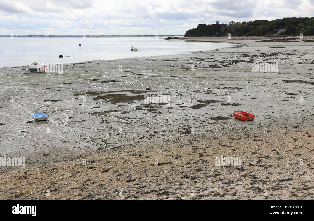 Cancale city beach in France during low tide and stranded boats Stock ...