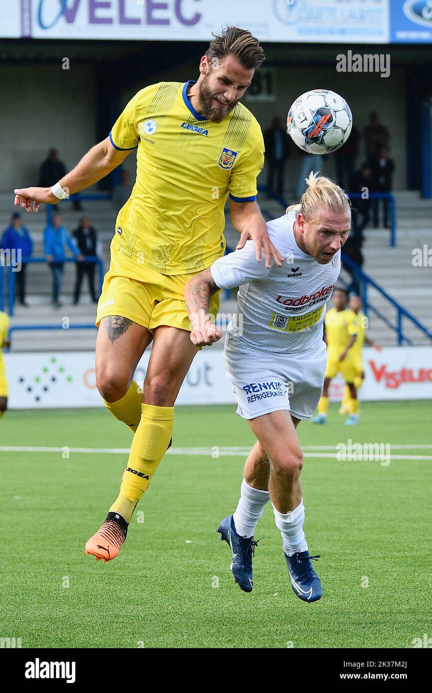 Beveren's Daniel Maderner and Vise's Jonathan Legear fight for the ball ...