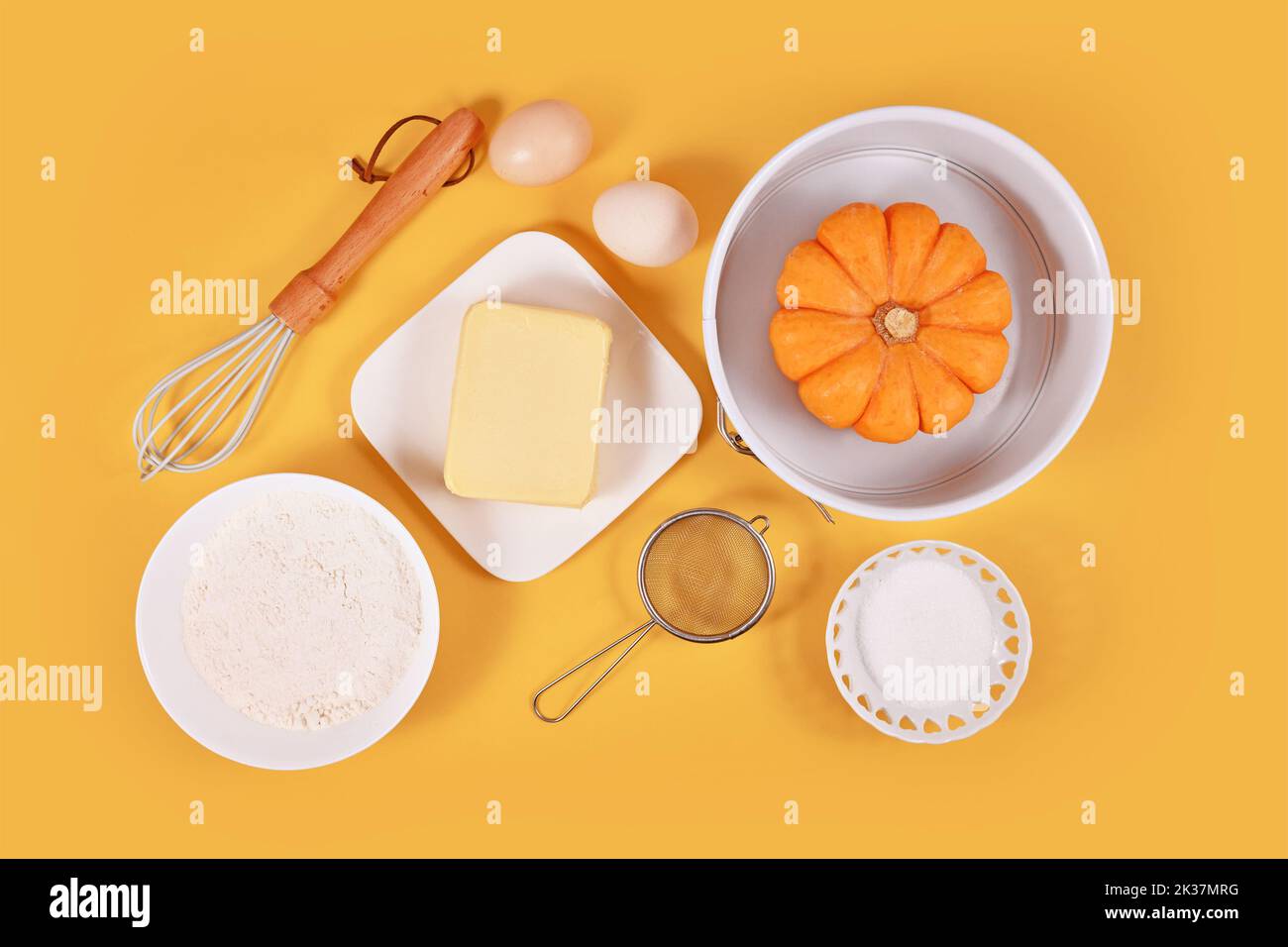 Pumpkin pie ingredients and baking tools on yellow background Stock ...
