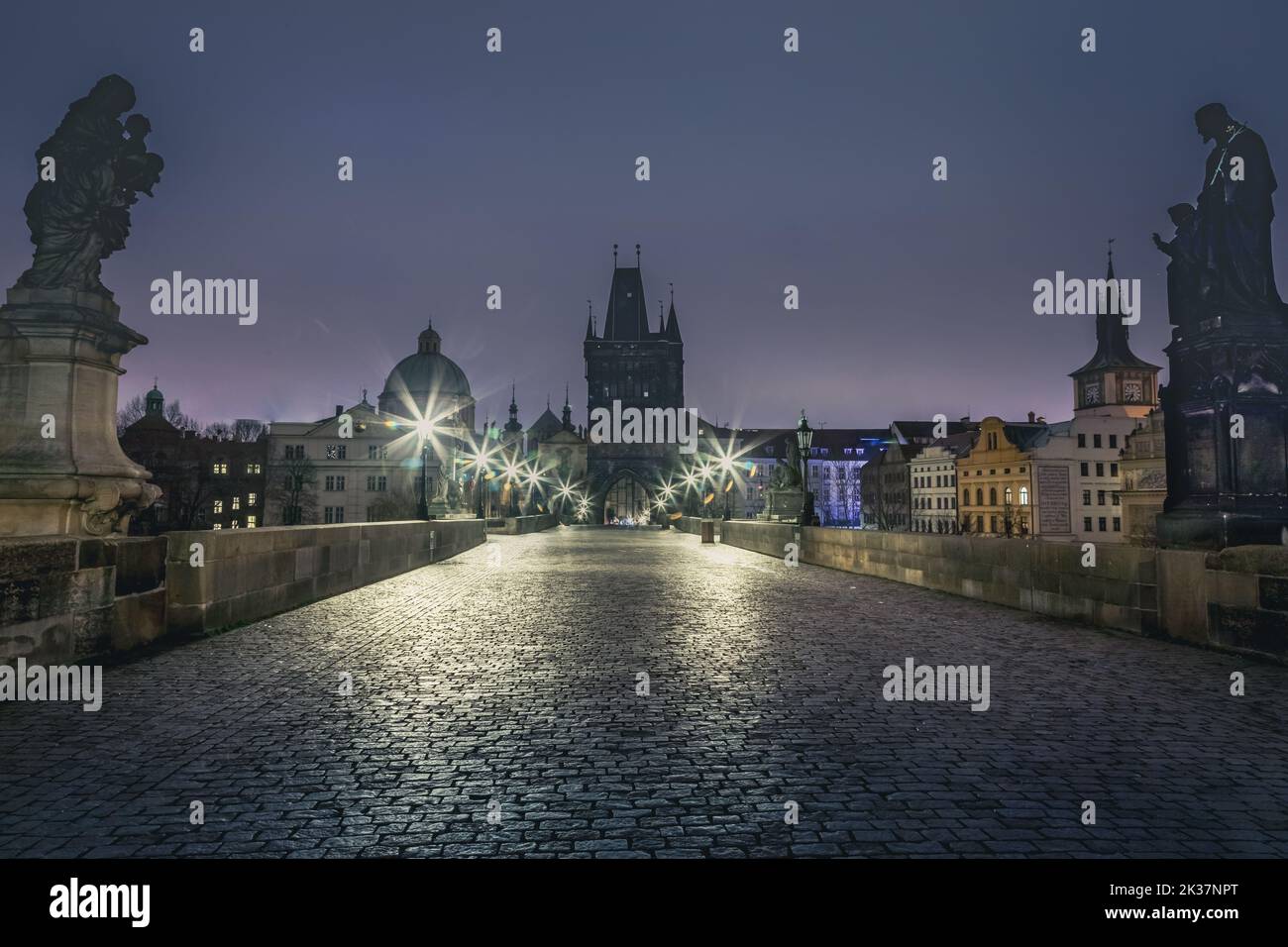 Charles bridge illuminated at dawn, Medieval Prague, Czech Republic Stock Photo - Alamy