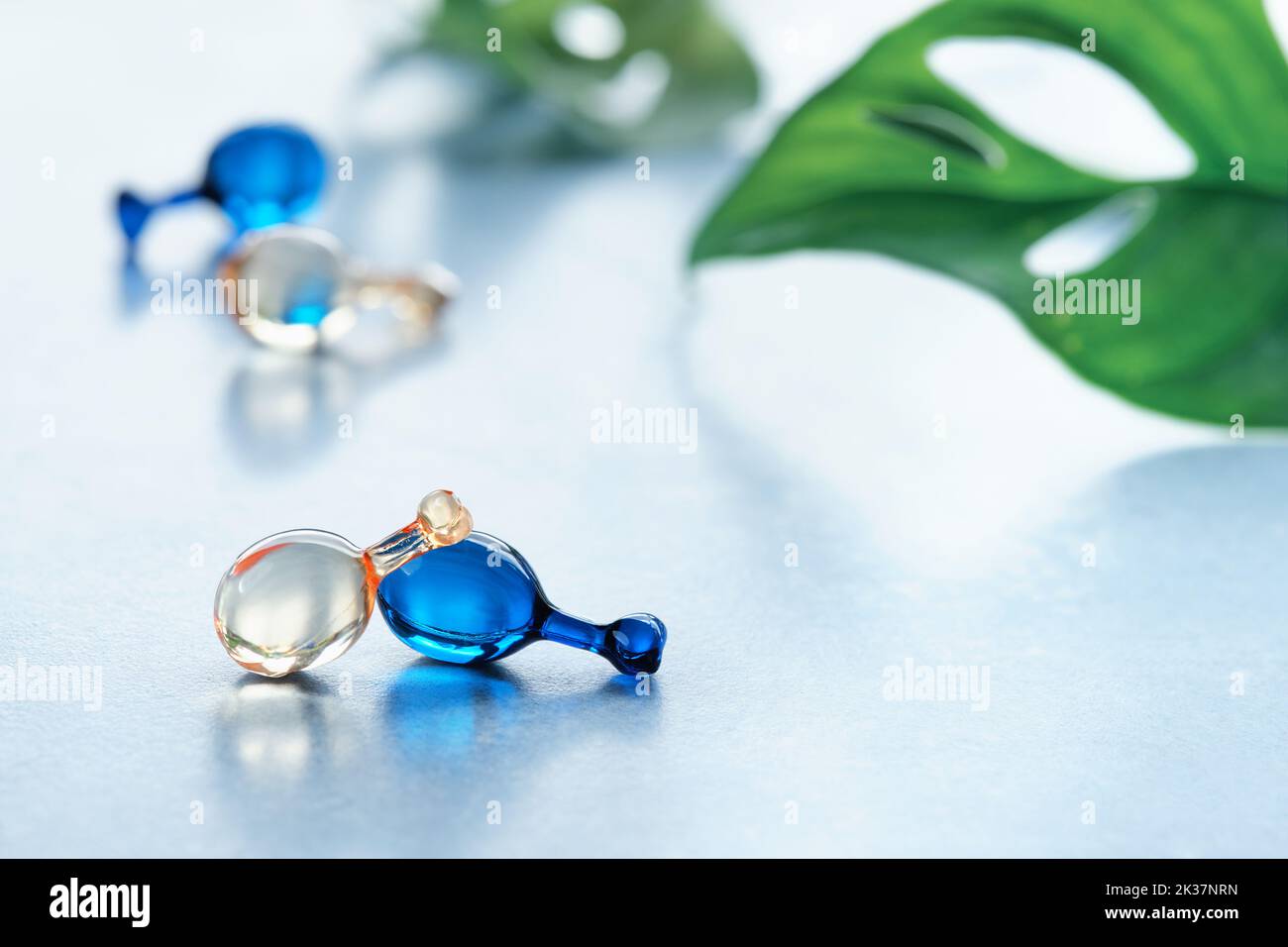 Serum capsules for healthy skin, blue and yellow. Anti-wrinkle ...