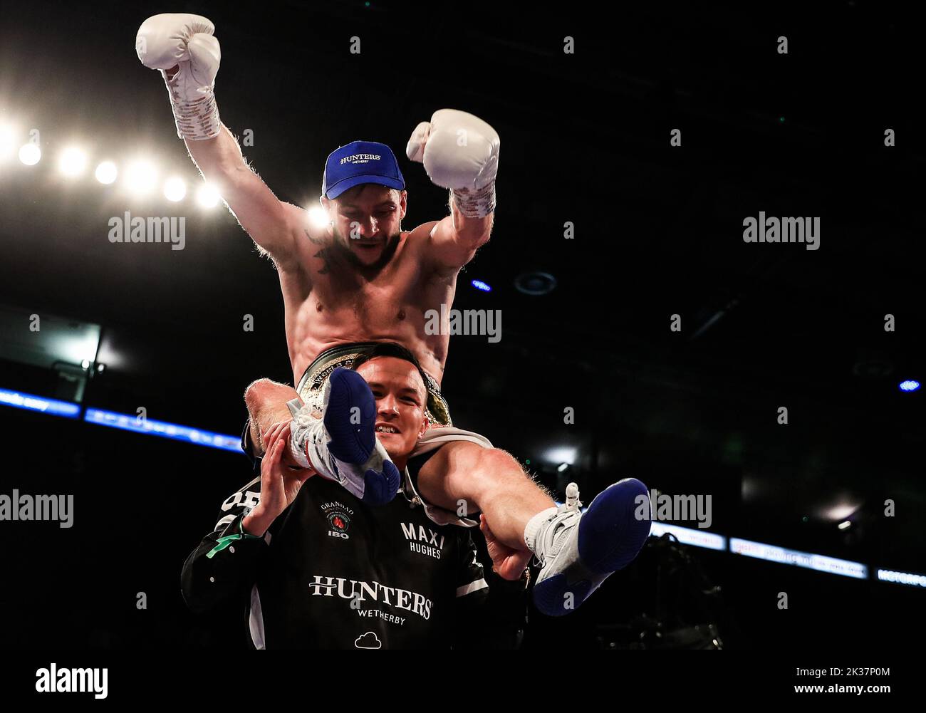 Maxi Hughes celebrates winning the IBO World Lightweight title fight ...