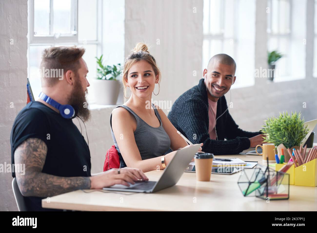 College students in class young woman discussing group project with ...