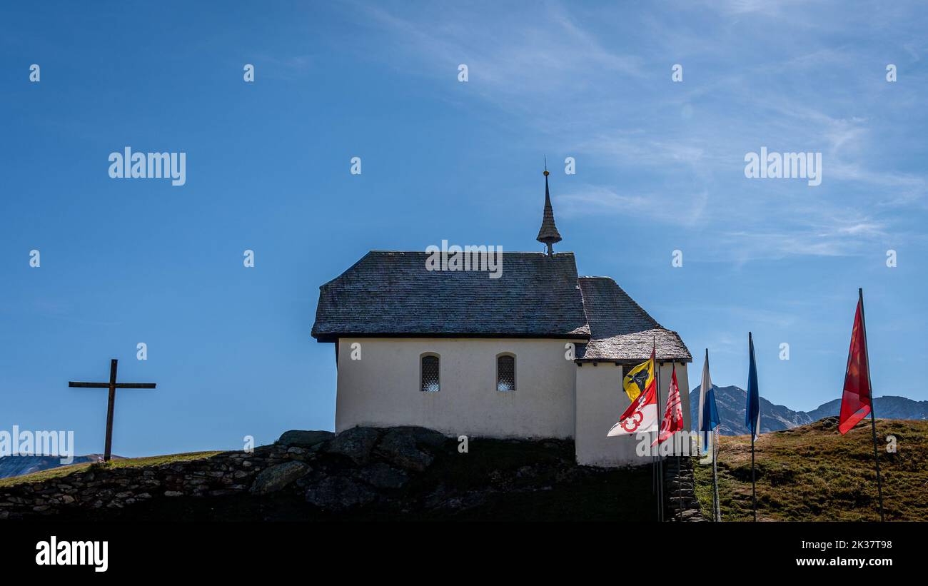 Landscape of church and mountains. Swiss Bettmeralp church with Swiss ...