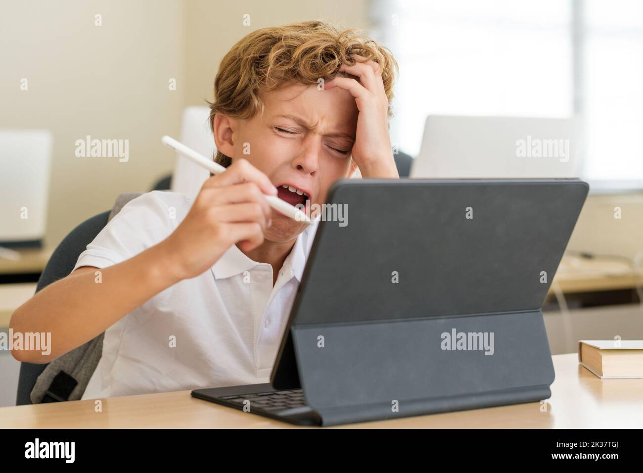 Boy crying classroom hi-res stock photography and images - Alamy