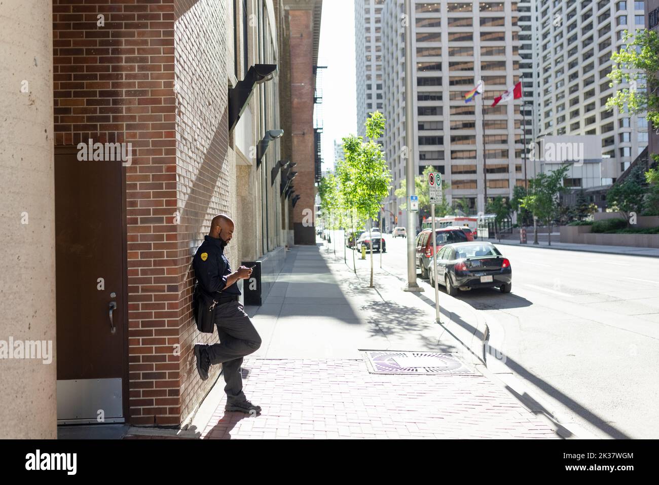 Standing looking security protection uniform hi-res stock photography ...