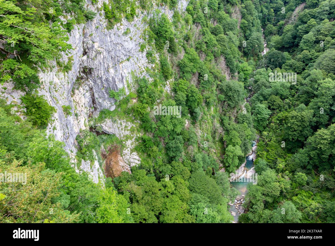 Okatse Canyon with vertical steep walls and Okatse wild river at the ...