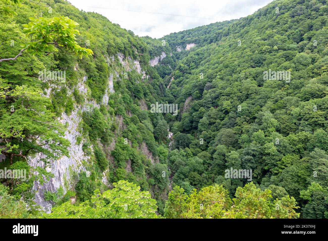 Okatse Canyon with vertical steep walls and Okatse wild river at the ...