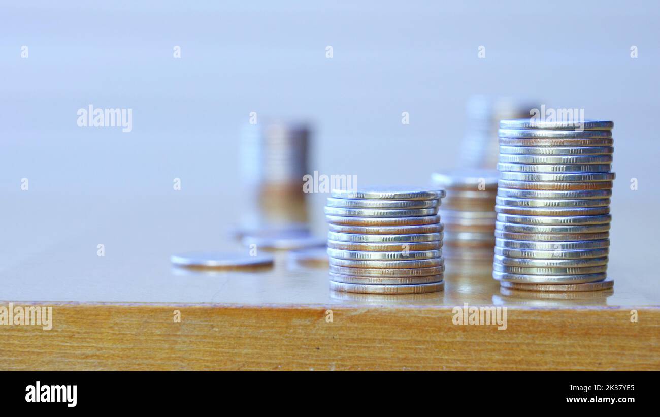 Coin stacks on a white background. Growth money of profitability of ...
