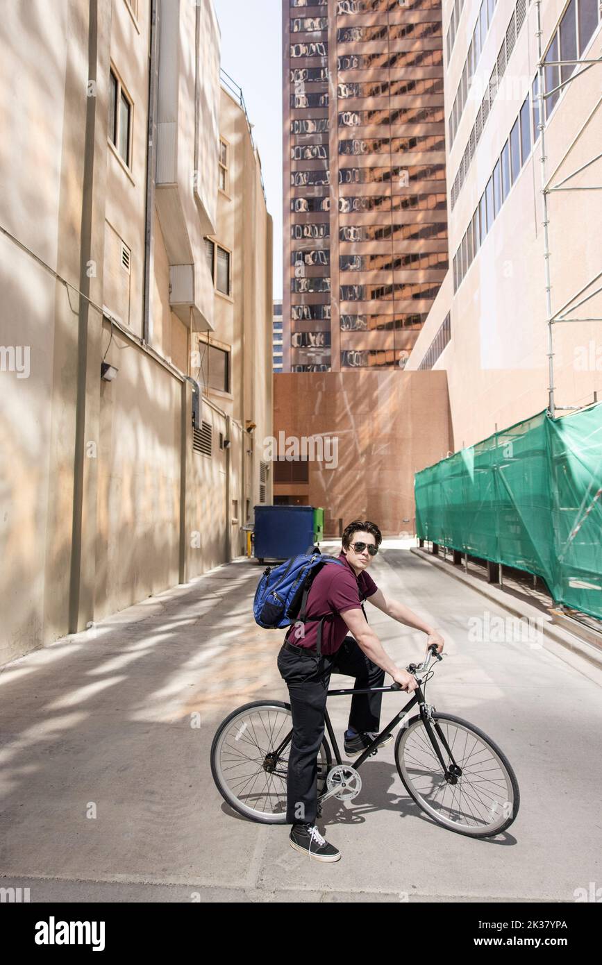 Teen bicycle buildings hi-res stock photography and images - Alamy
