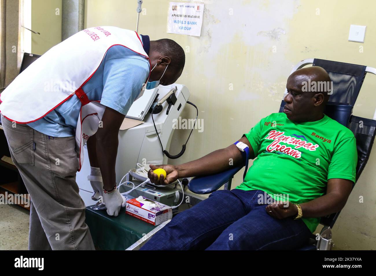 Alpha Kennedy Sanya (R), Kenya’s blood ambassador is seen donating ...